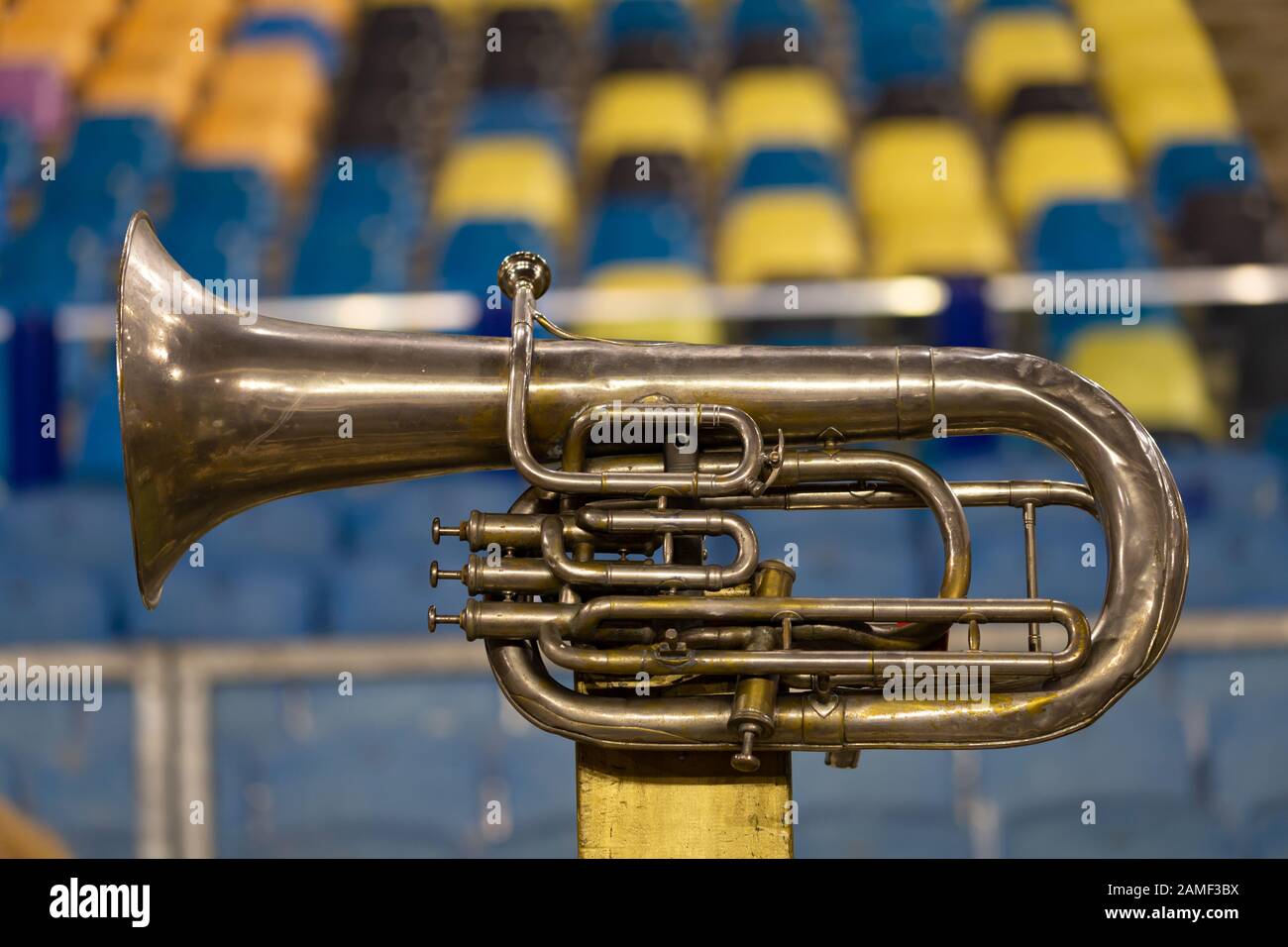 Vintage copper trumpet in front of a colorful background Stock Photo ...