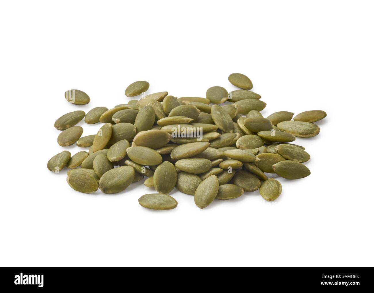 A pile of peeled pumpkin seeds isolated on white background Stock Photo ...