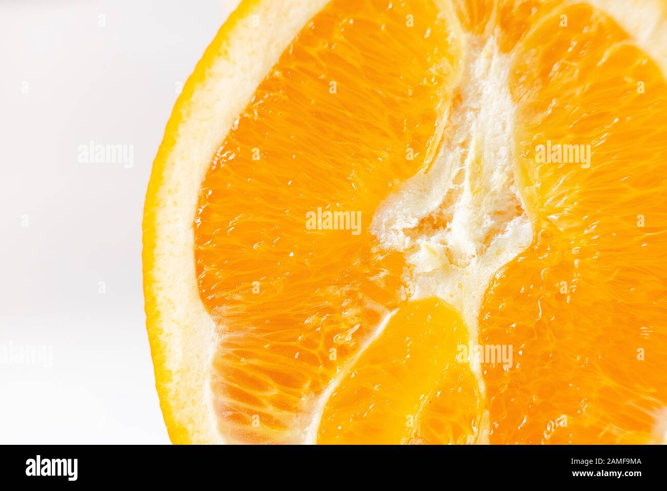 Close up of orange fruit texture on white background. Slice of ripe ...