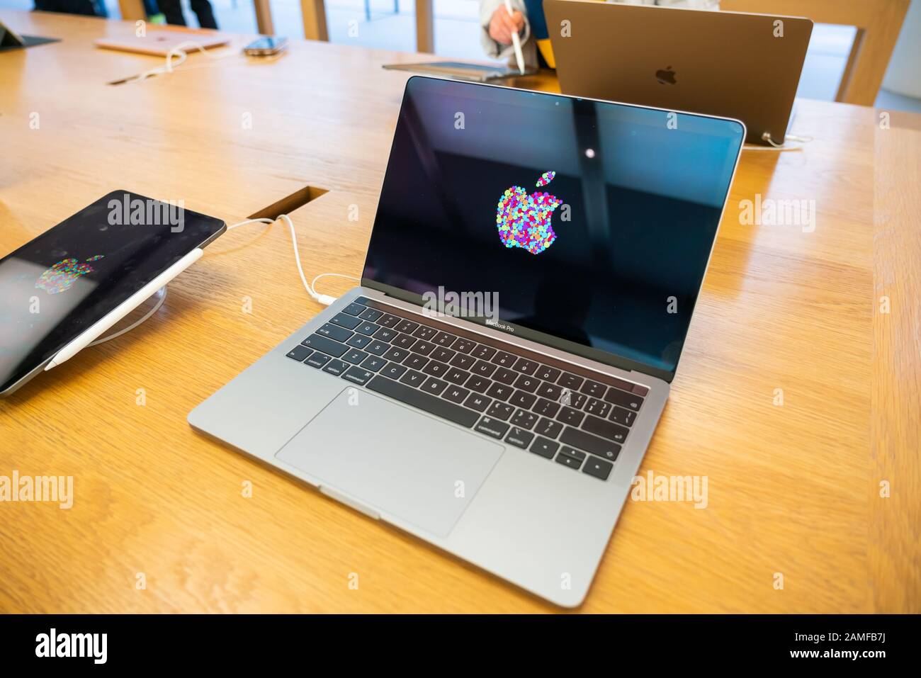 American multinational technology company Apple logo seen on a screen ...