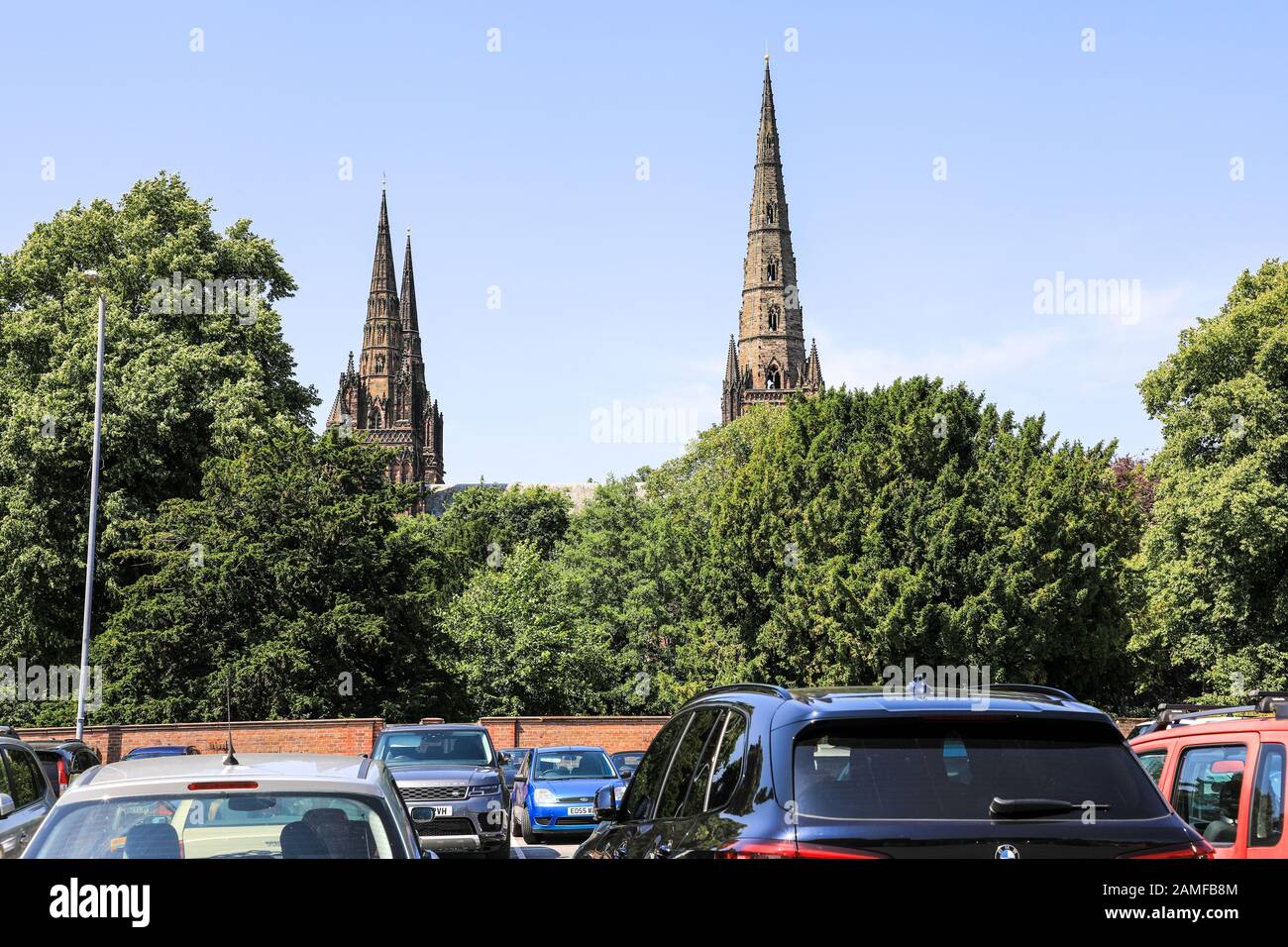 The 3 spires of Lichfield Cathedral above a car park in Lichfield ...