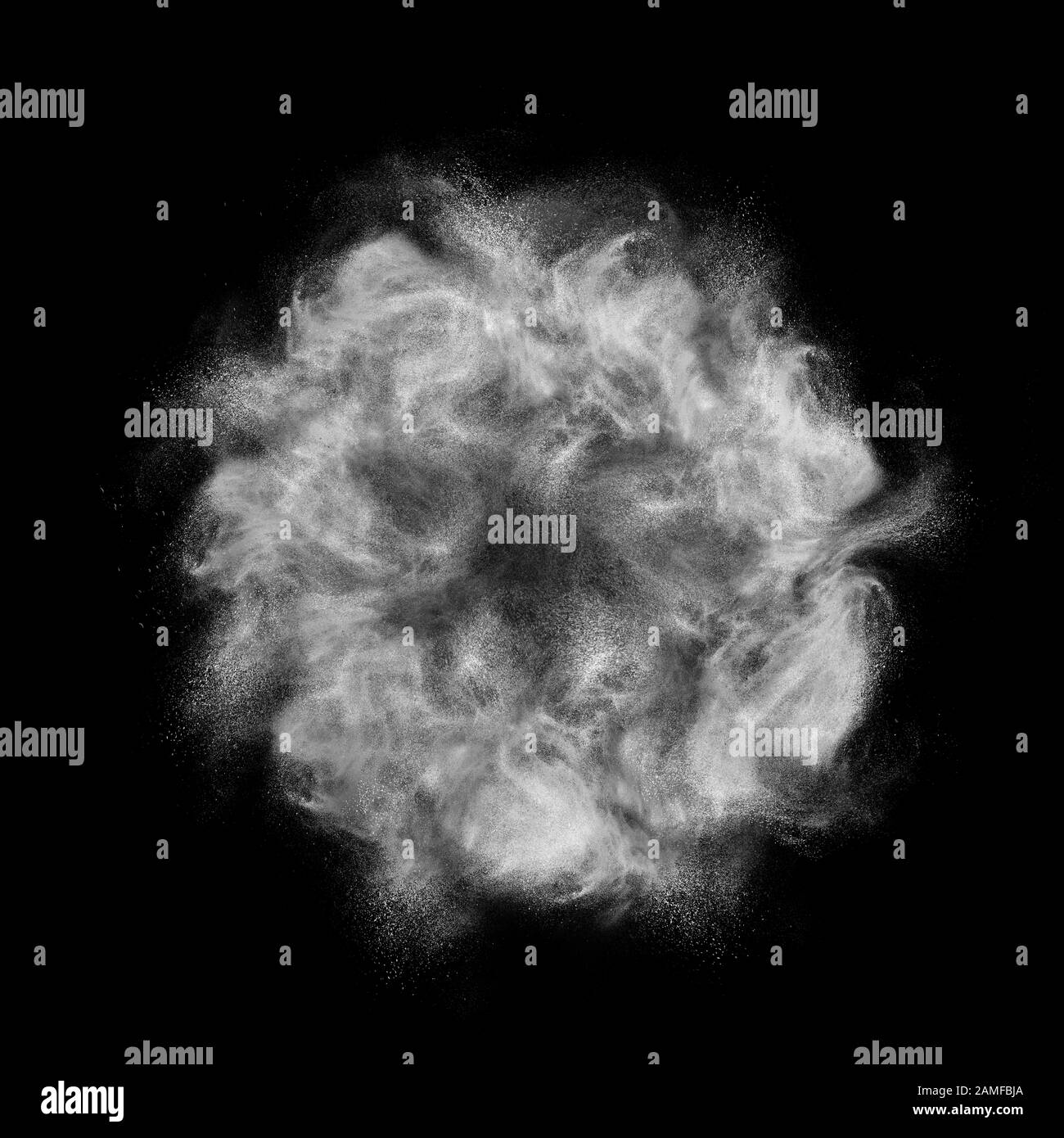 White powder explosion in the shape of round frame on a black ...