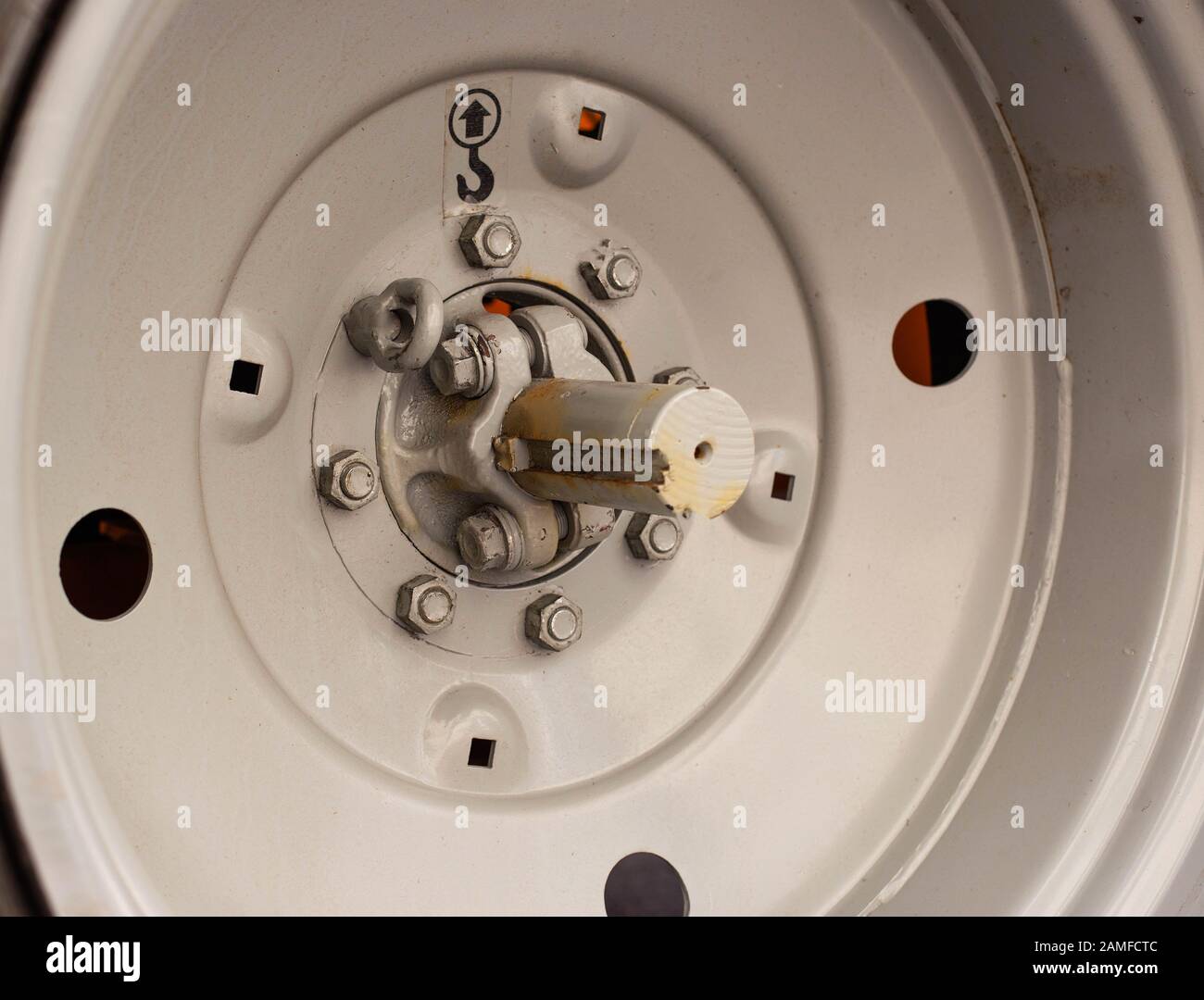 rear metal wheel disc from tractor, background Stock Photo - Alamy