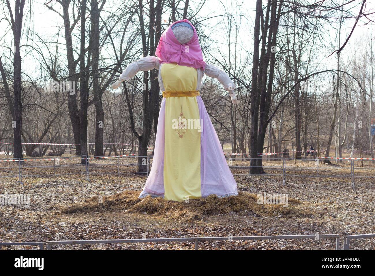 A scarecrow for inflammation by fire stands in nature. The traditional ...