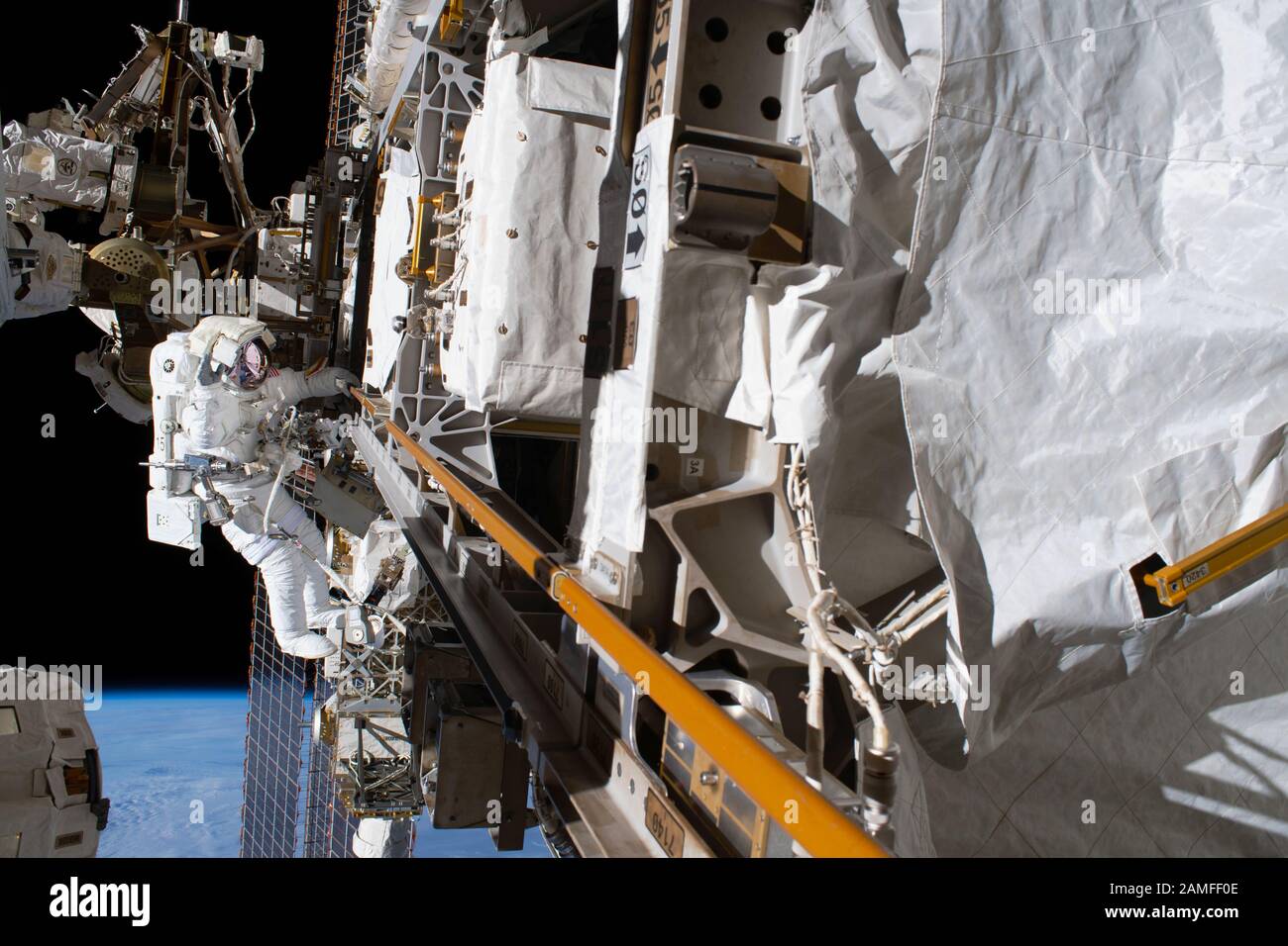 ISS - 22, 2019) --- Astronaut Andrew Morgan of NASA is tethered to the ...