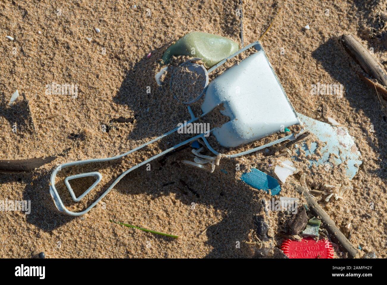 Plastic trashes on the beautiful sandy beach Stock Photo - Alamy
