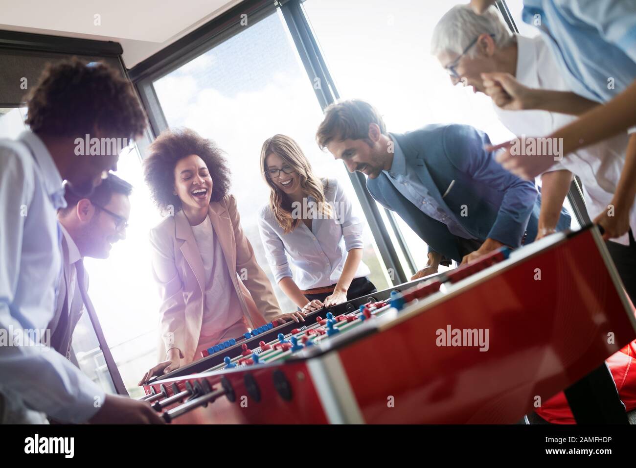 Office workers playing football hi-res stock photography and images - Alamy