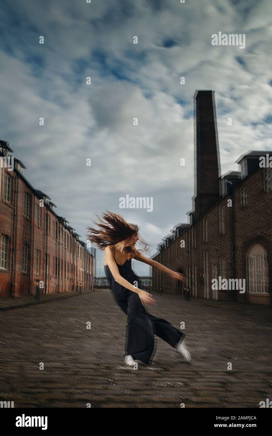 A young contemporary dancer in a street in Dundee Scotland Stock Photo ...