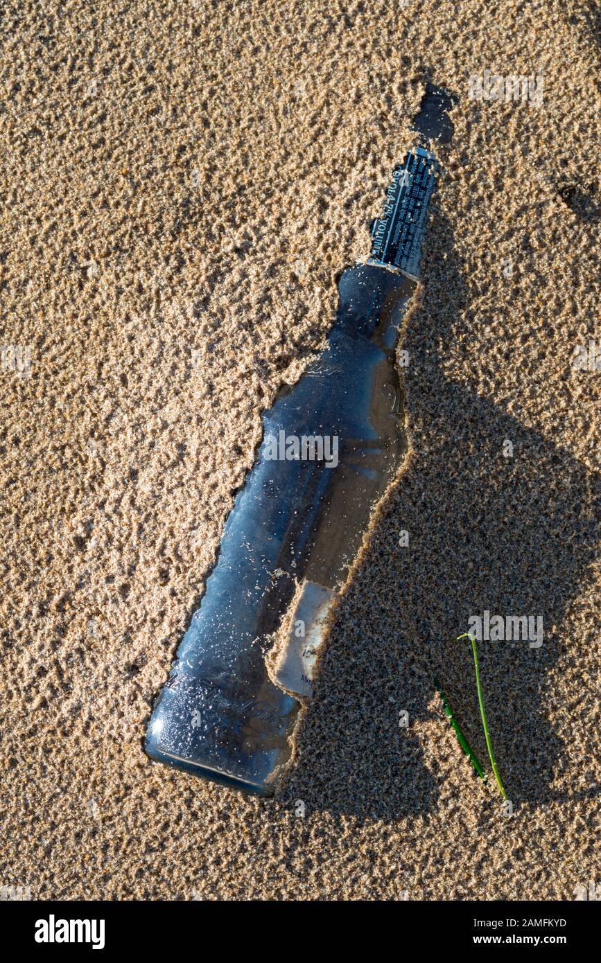 Plastic trashes on the beautiful sandy beach Stock Photo - Alamy