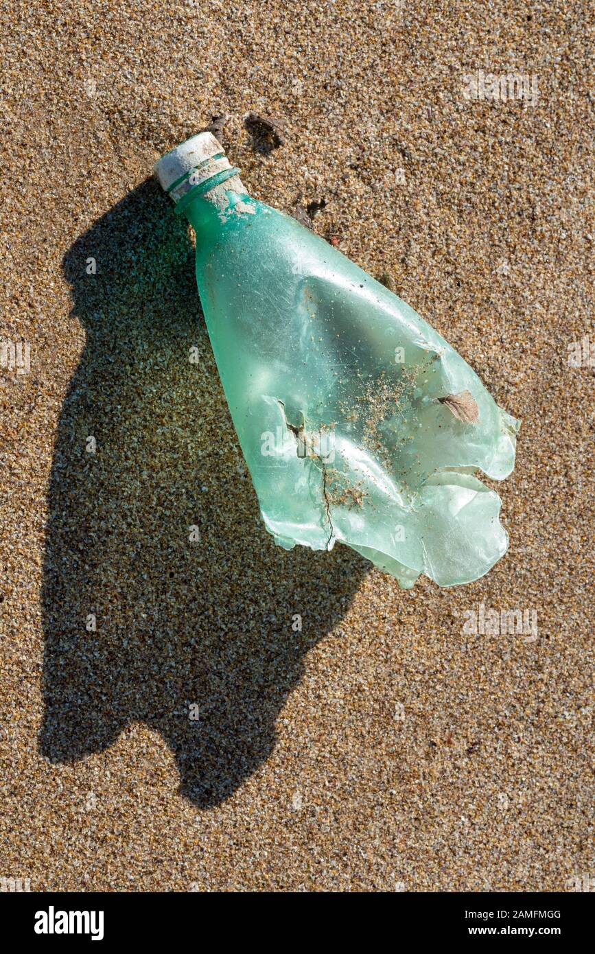 Plastic trashes on the beautiful sandy beach Stock Photo - Alamy