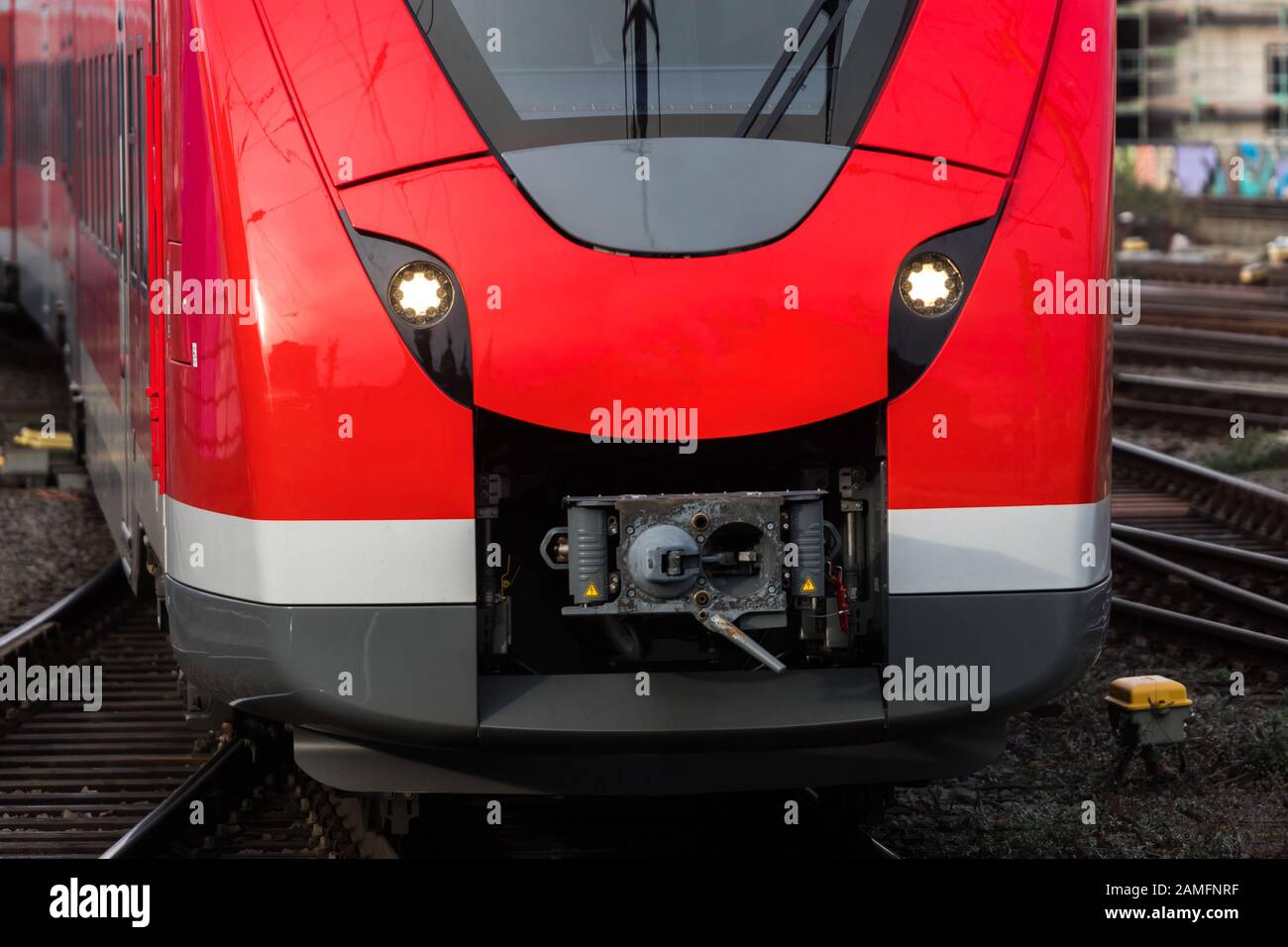 modern red passenger train Stock Photo - Alamy