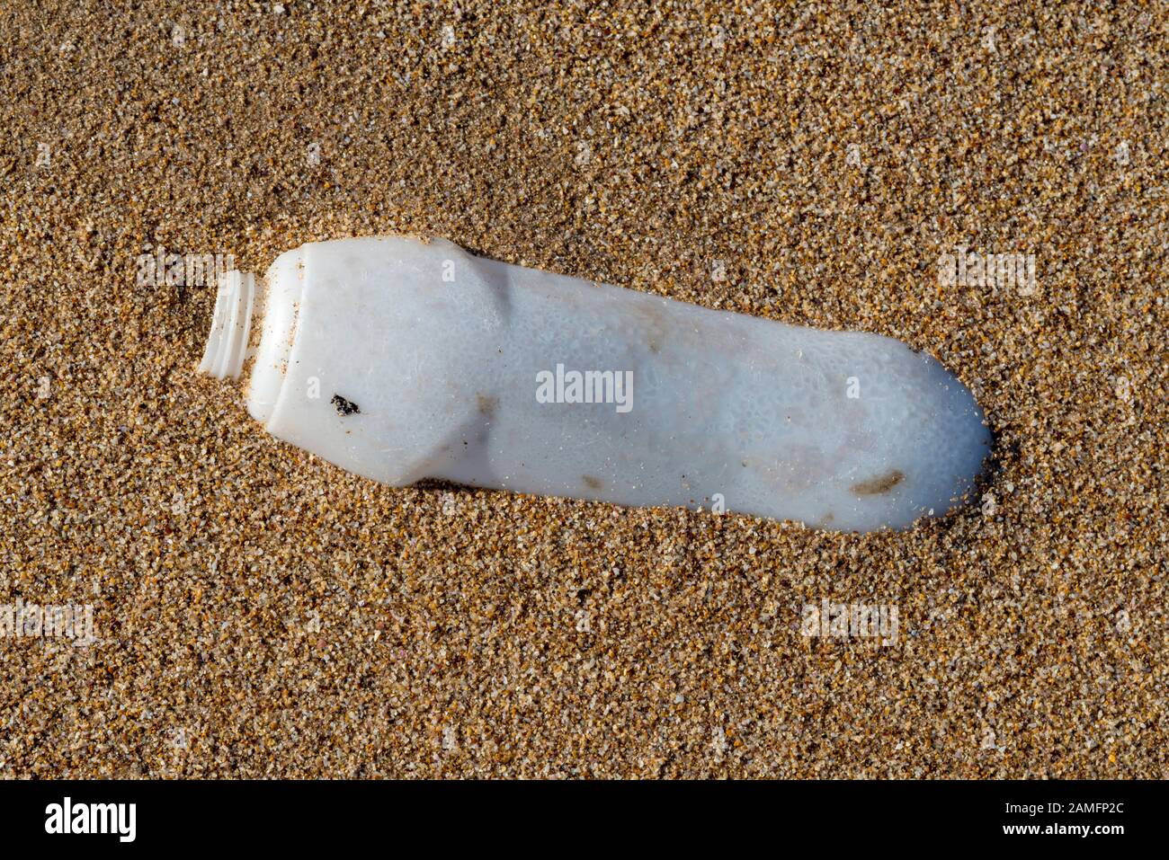 Plastic trashes on the beautiful sandy beach Stock Photo - Alamy