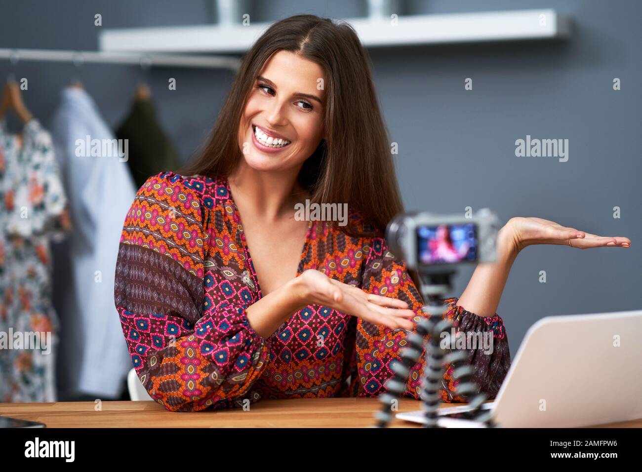 Fashion vlogger influencer recording live tutorial video Stock Photo ...