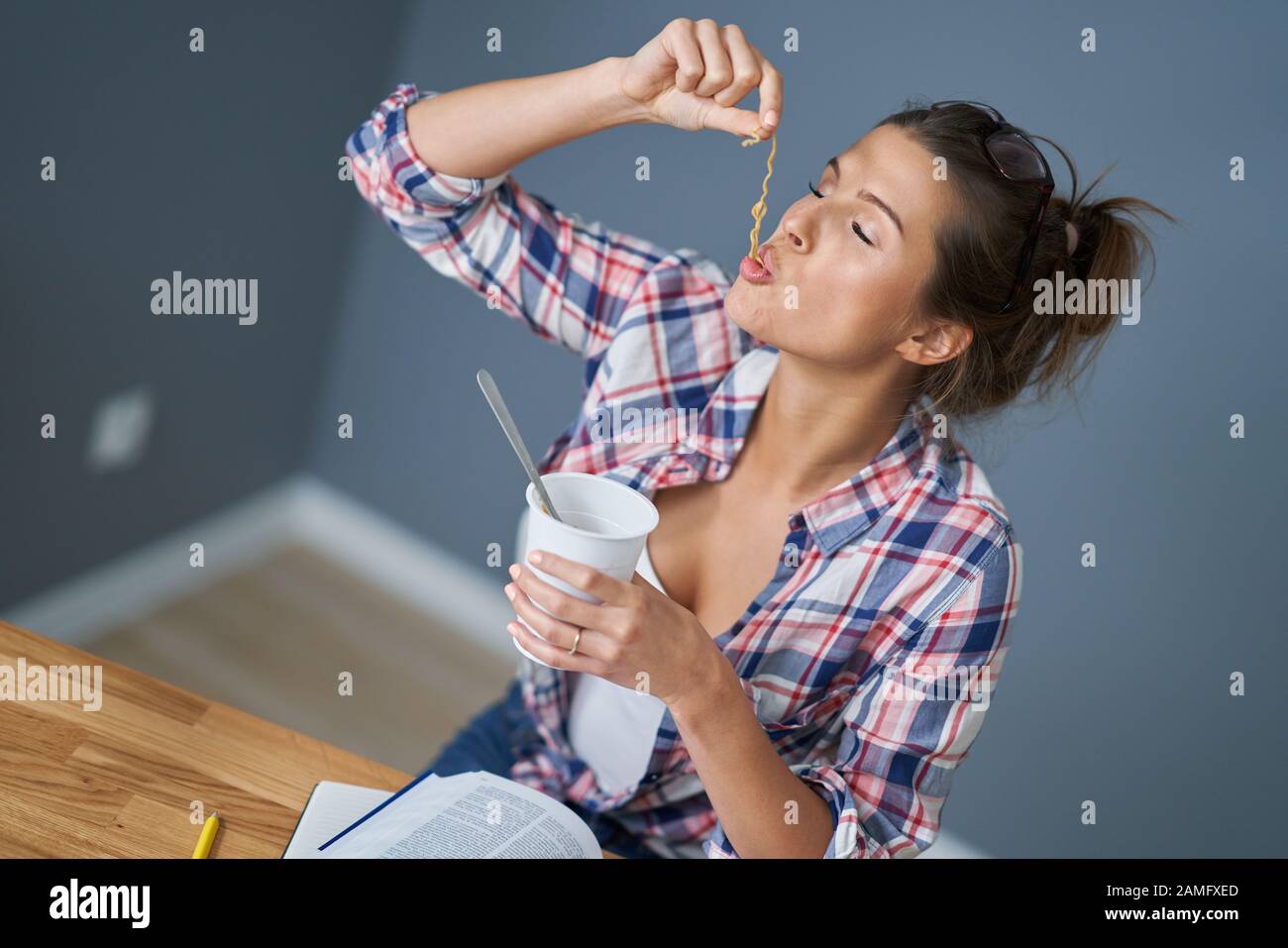 College student, studying, eating hi-res stock photography and images ...