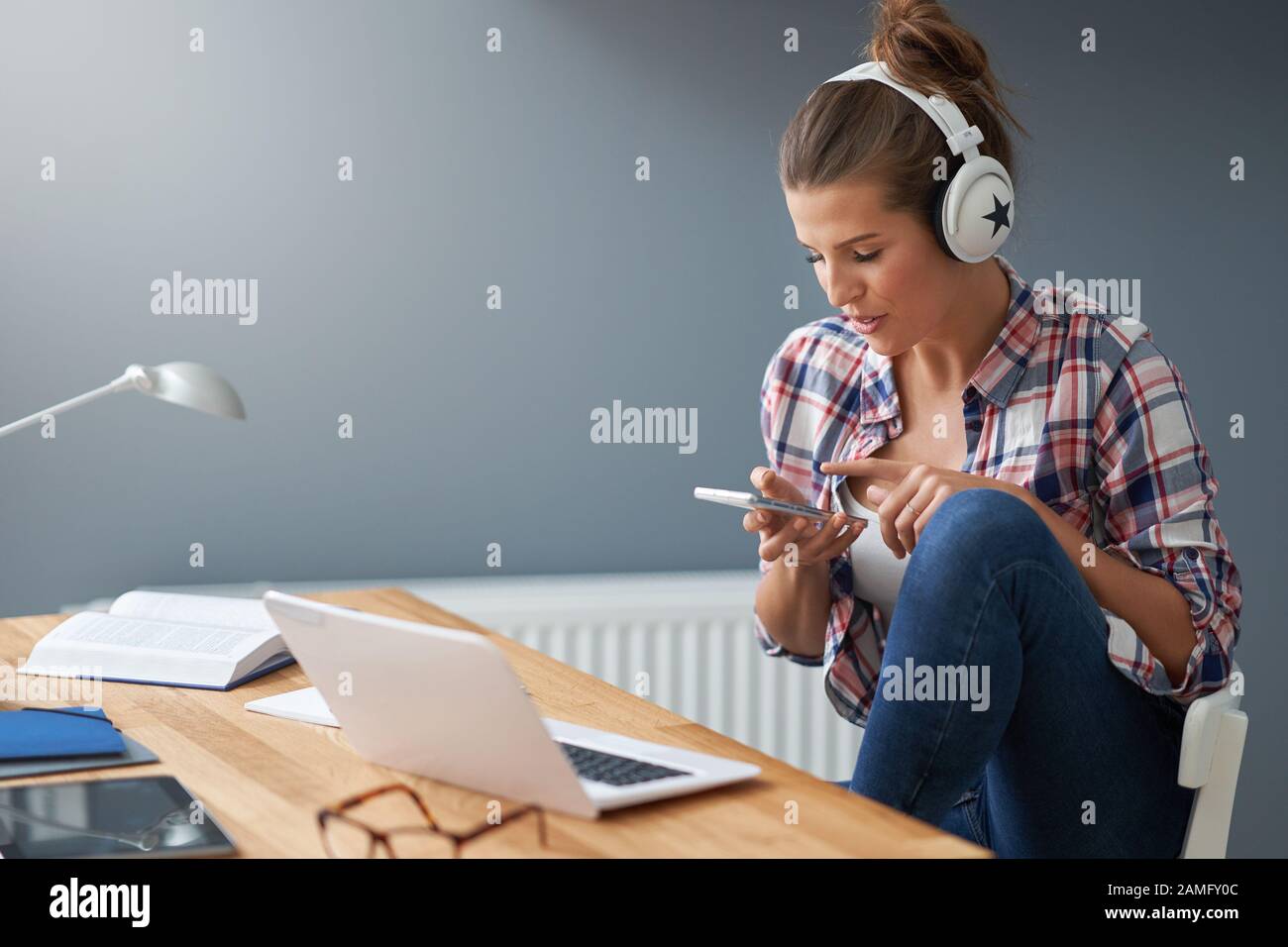 Female student learning at home Stock Photo - Alamy