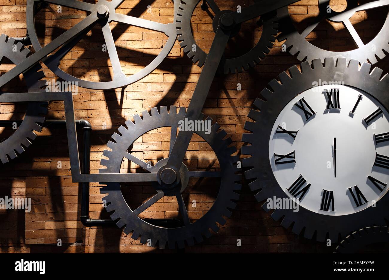 Wooden cogs clock hi-res stock photography and images - Alamy
