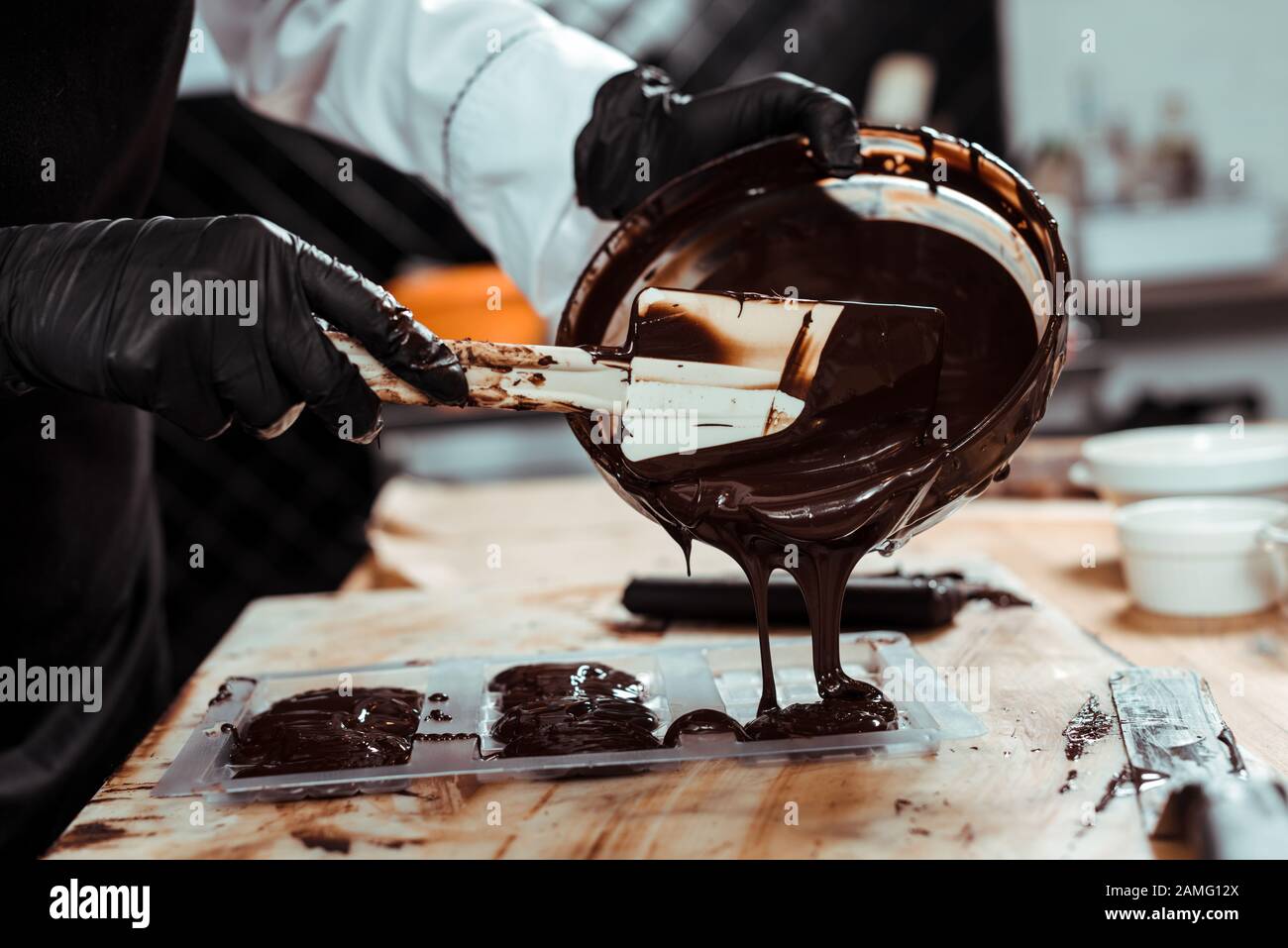 Pouring chocolate molds hi-res stock photography and images - Alamy