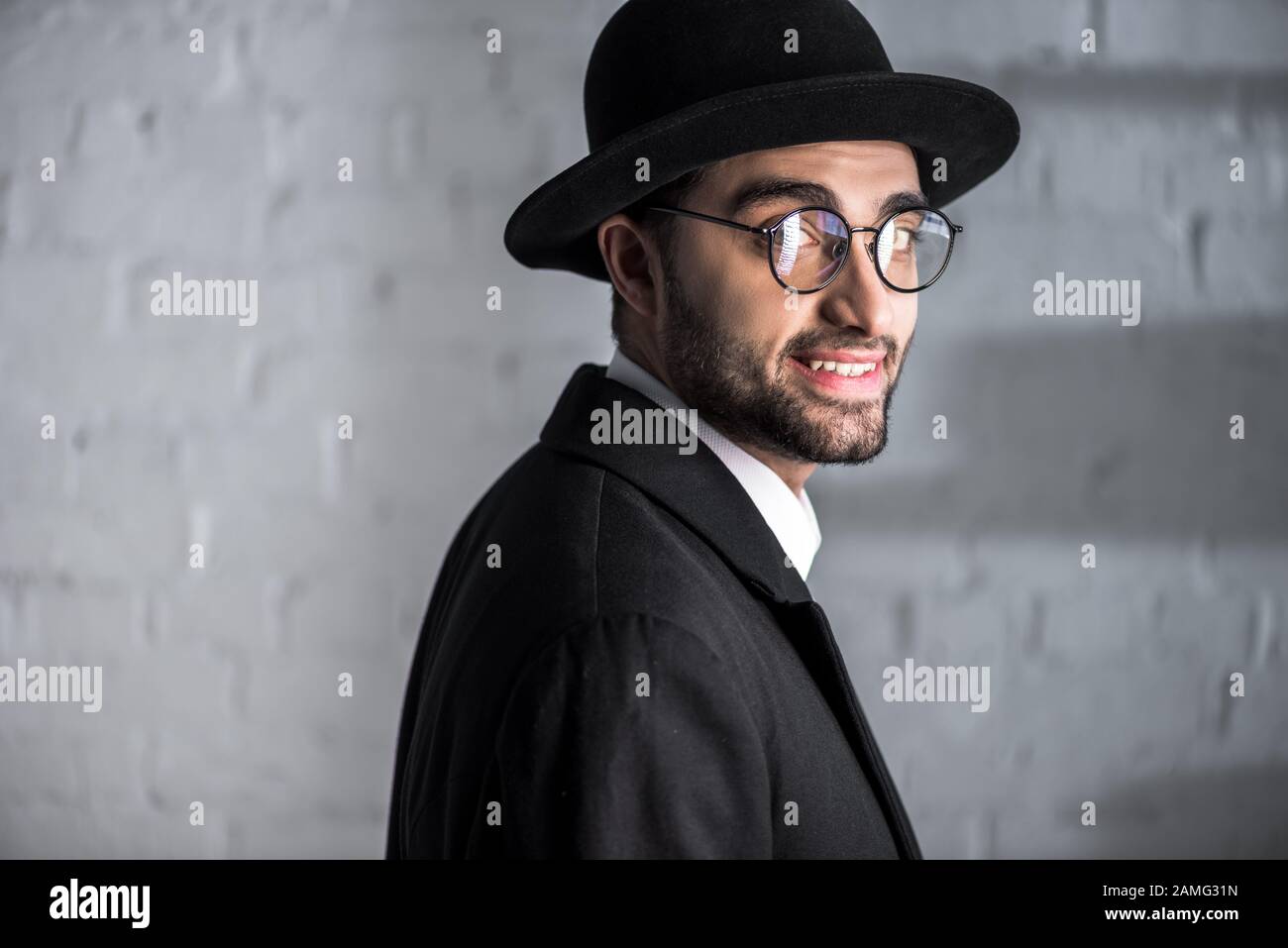handsome and smiling jewish man in glasses looking at camera Stock ...