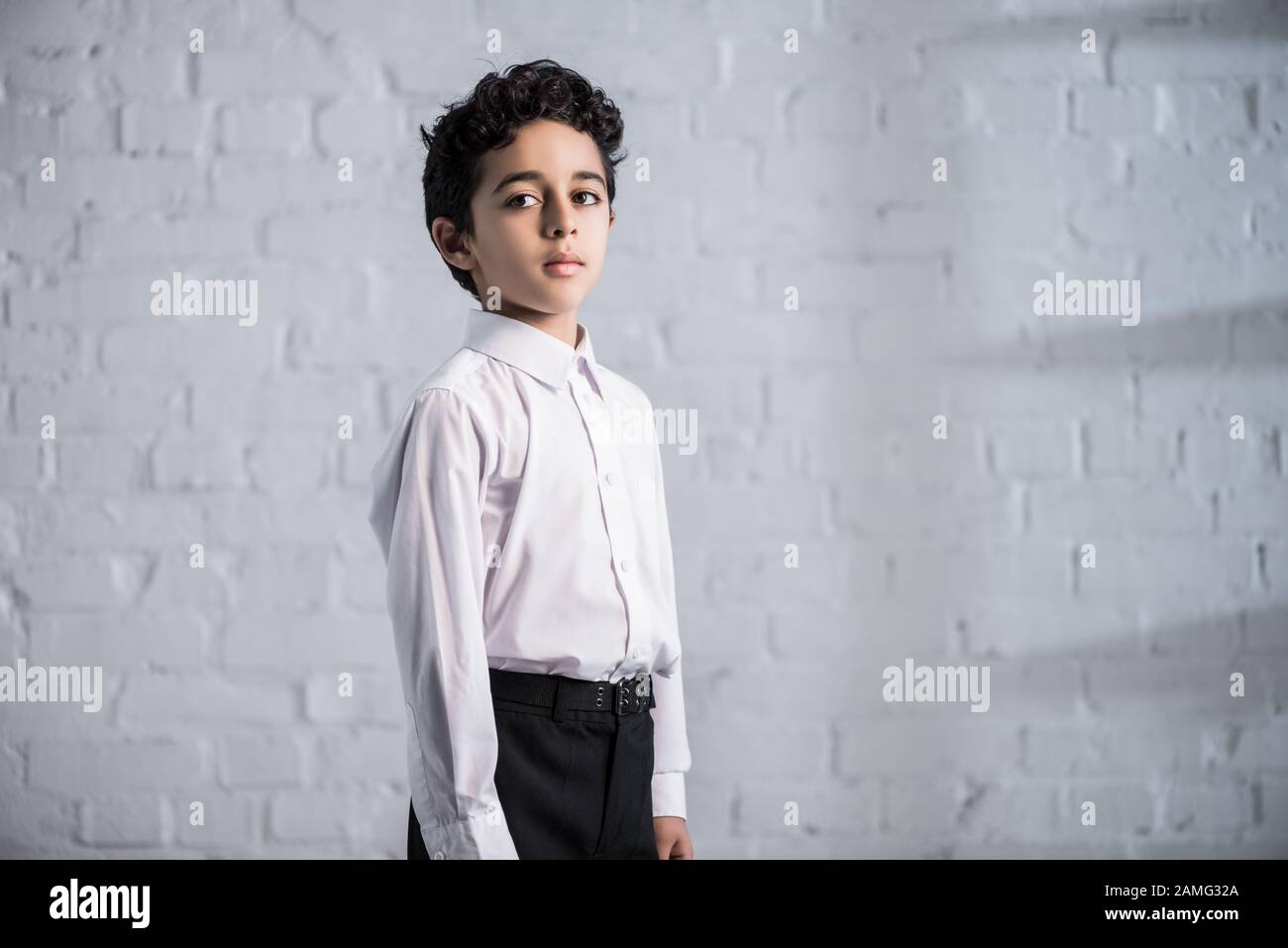 cute jewish boy in white shirt looking away Stock Photo - Alamy