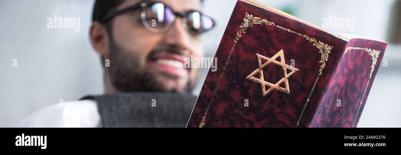 panoramic shot of smiling jewish man in glasses reading tanakh Stock ...