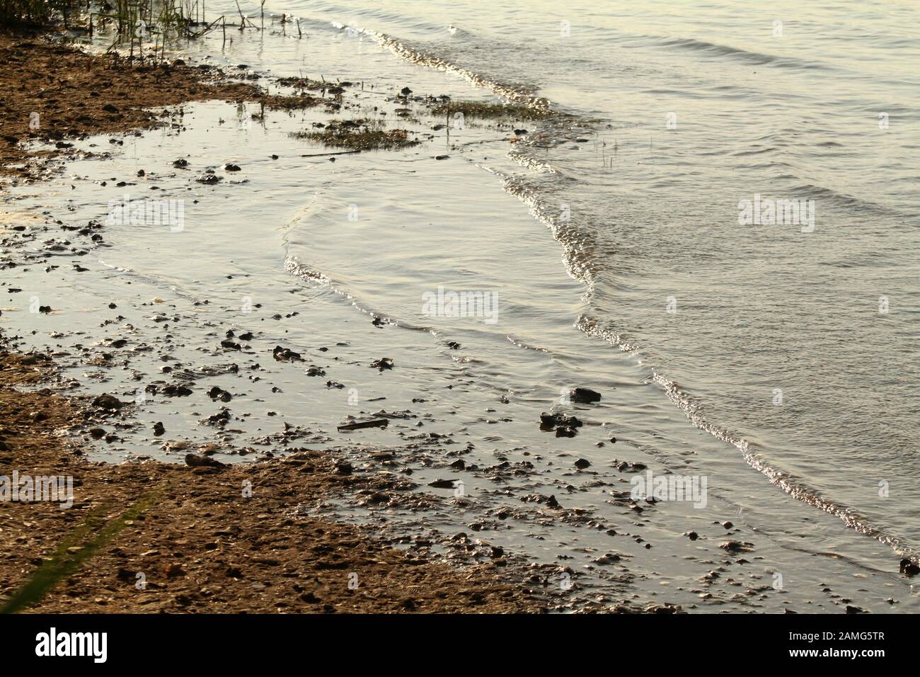 Water touching sand hi-res stock photography and images - Alamy