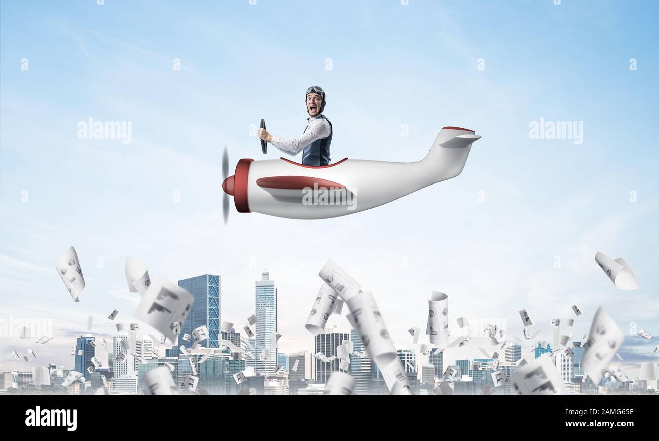 Satisfied emotional pilot sitting in airplane Stock Photo - Alamy
