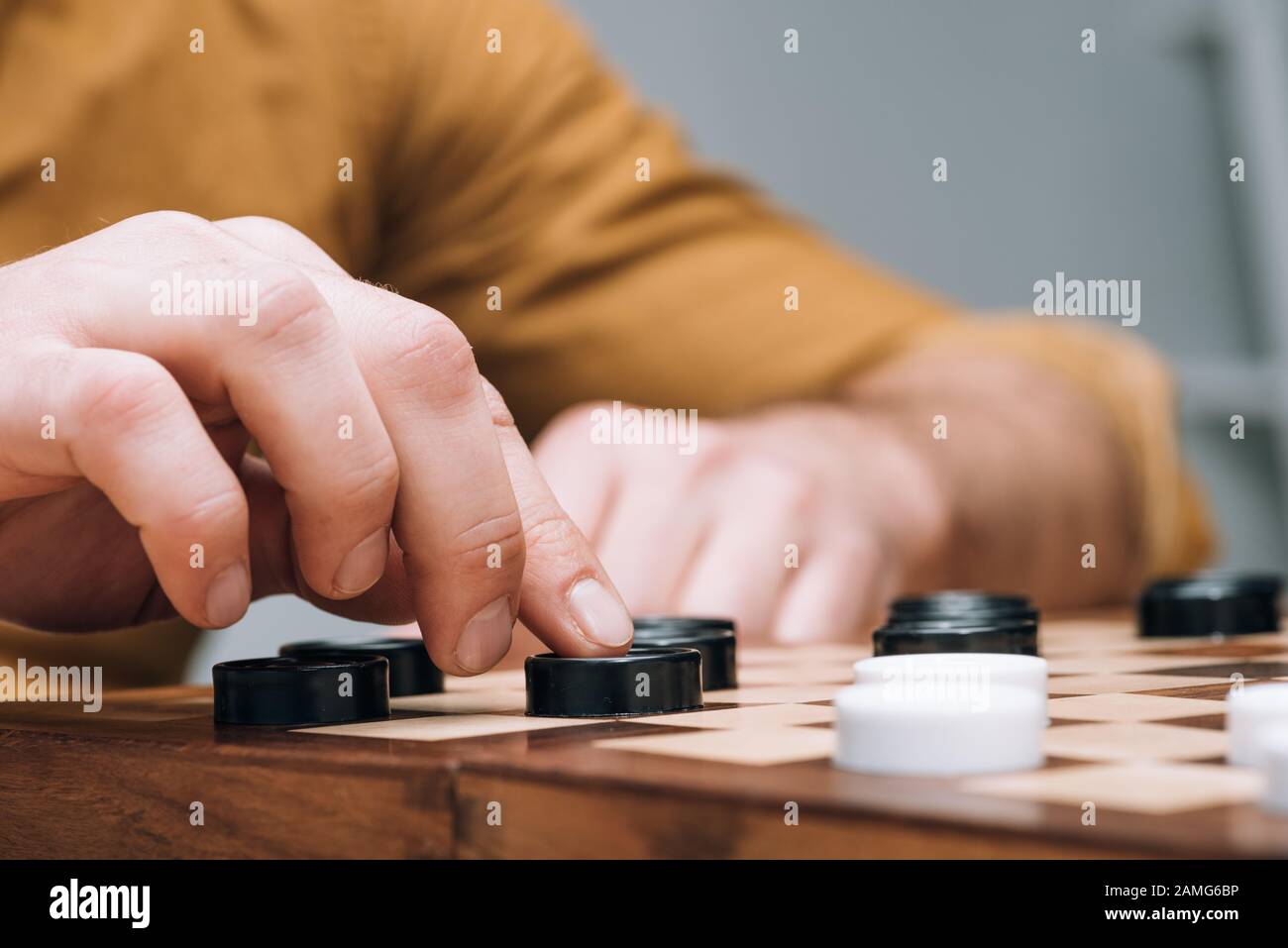 Person playing checkers hi-res stock photography and images - Alamy