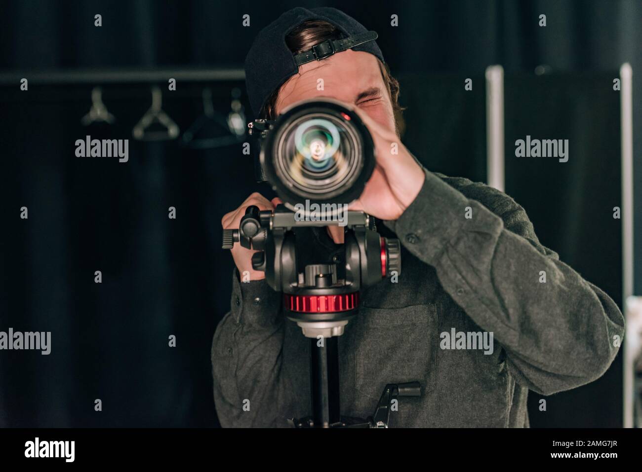 Photographer work looking through camera hi-res stock photography and images - Alamy