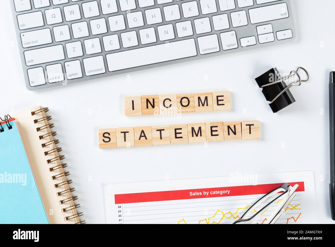 Income statement concept with letters Stock Photo - Alamy