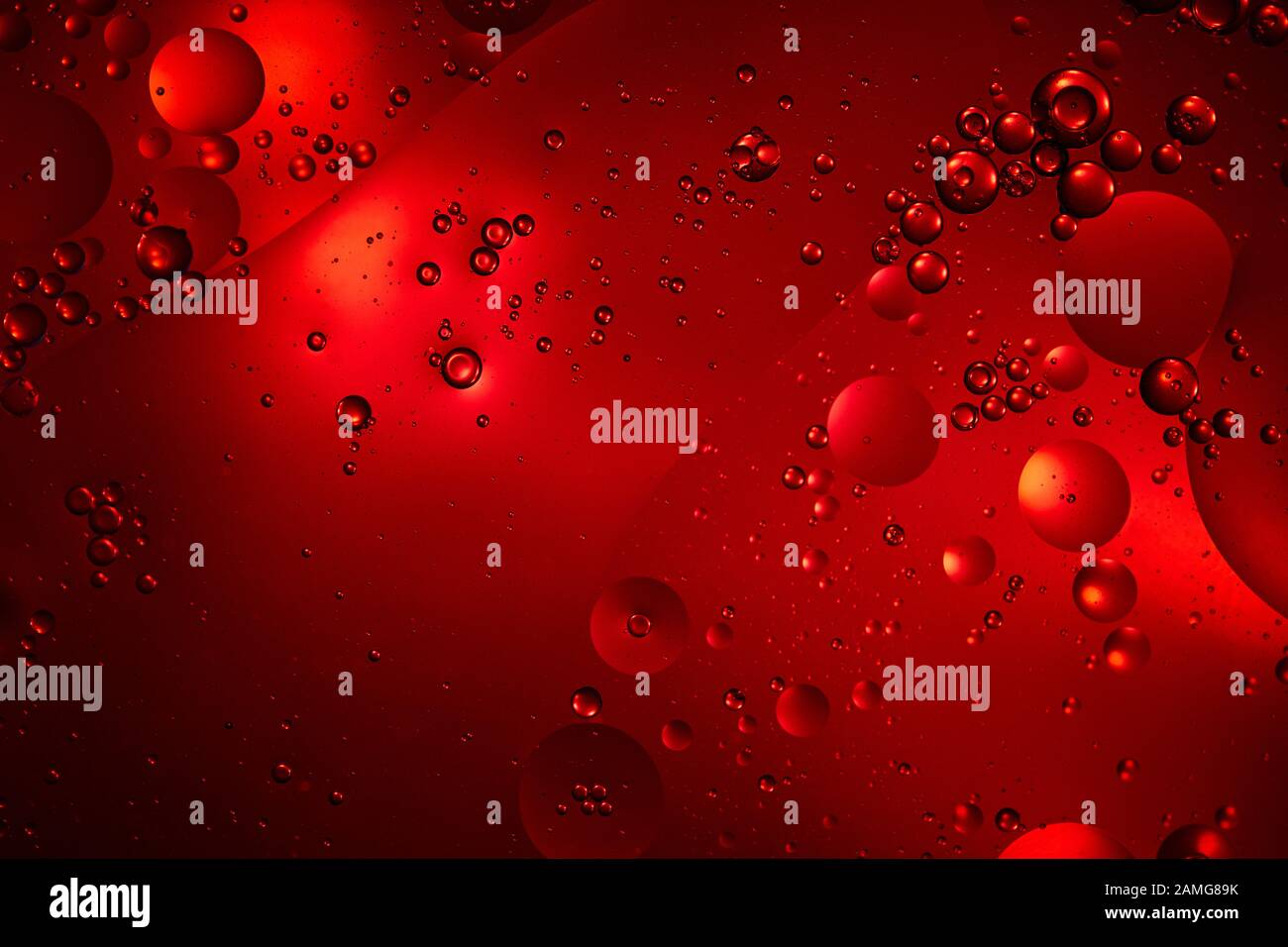 Beautiful red color abstract background from mixed water and oil ...