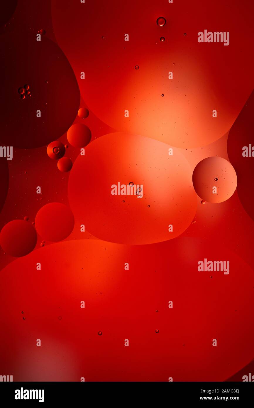 Beautiful red color abstract background from mixed water and oil ...