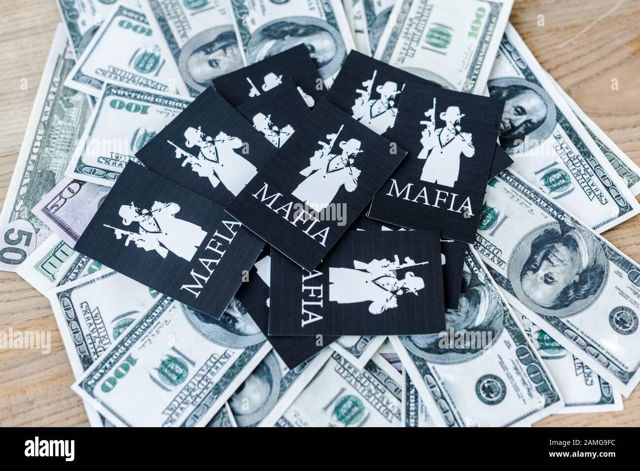 KYIV, UKRAINE - NOVEMBER 22, 2019: top view of dollar banknotes near ...