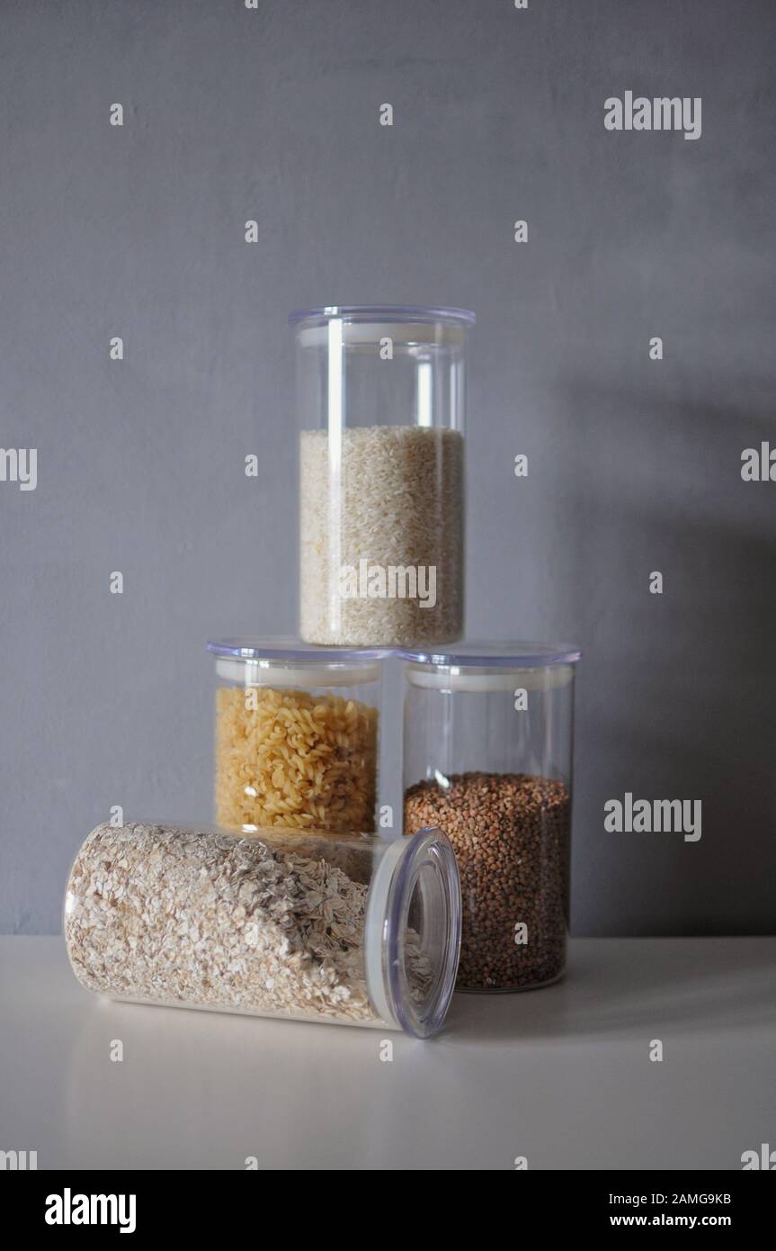 Set of various uncooked cereals for healthy cooking in a glass jars ...