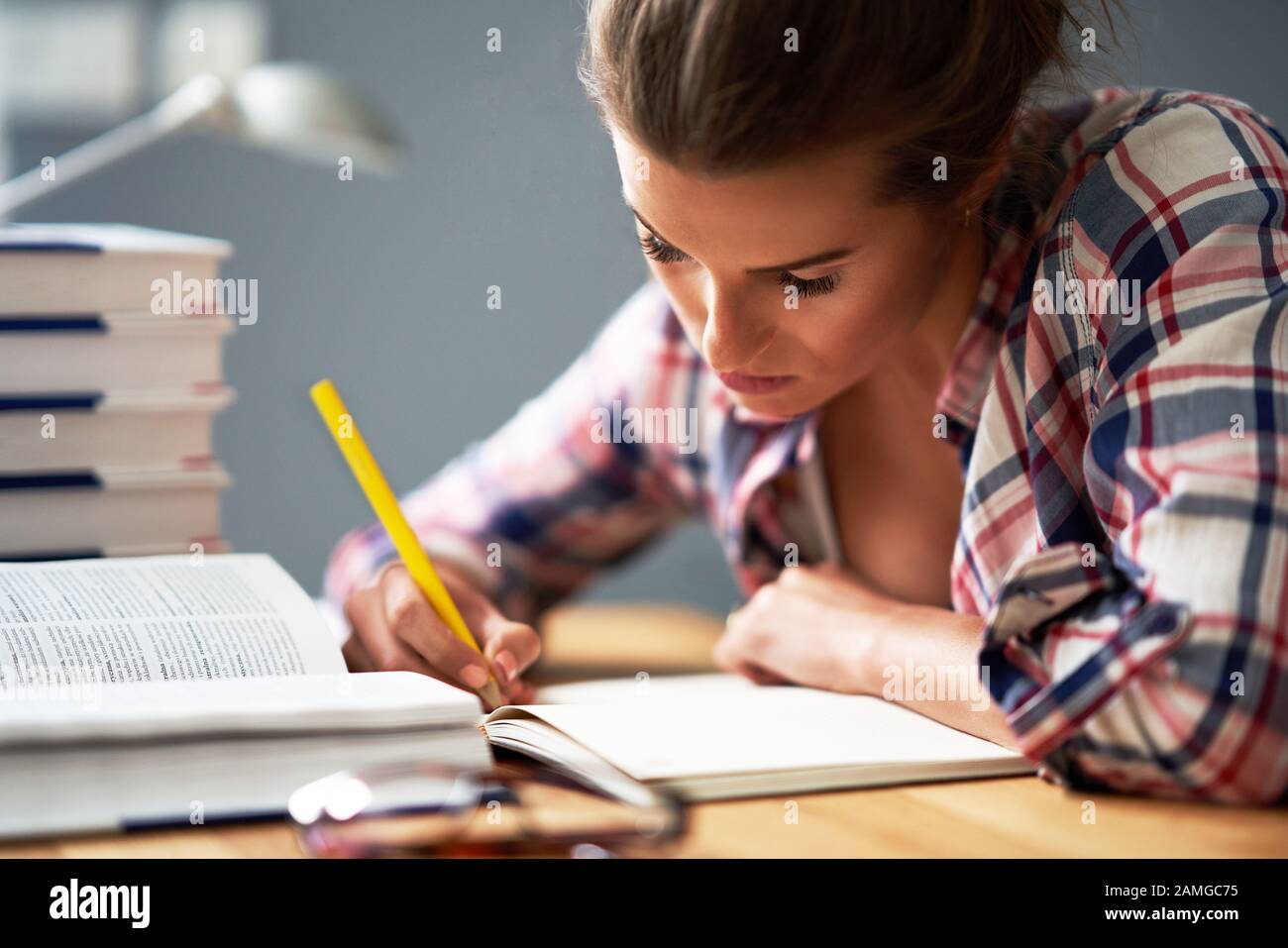 Female student learning at home Stock Photo - Alamy