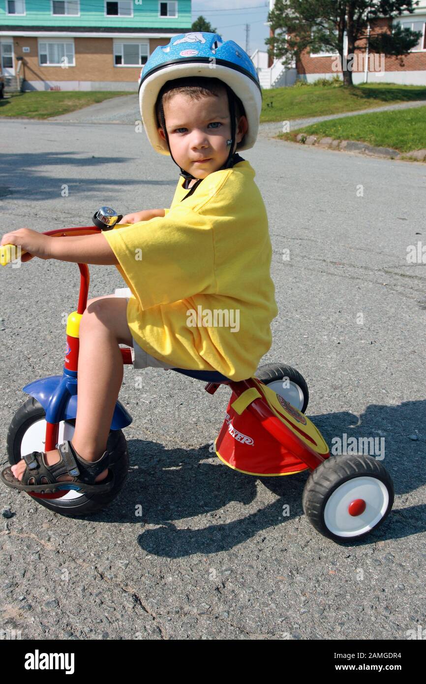 Boy on a tri cycle hi-res stock photography and images - Alamy
