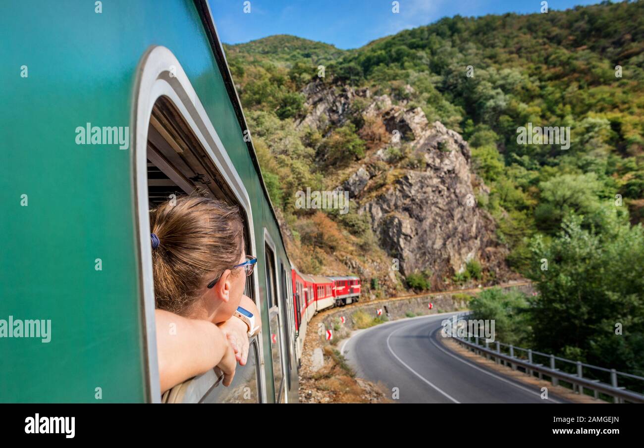 red retro train in Bulgaria mountains, Alpine railway in the Balkans ...