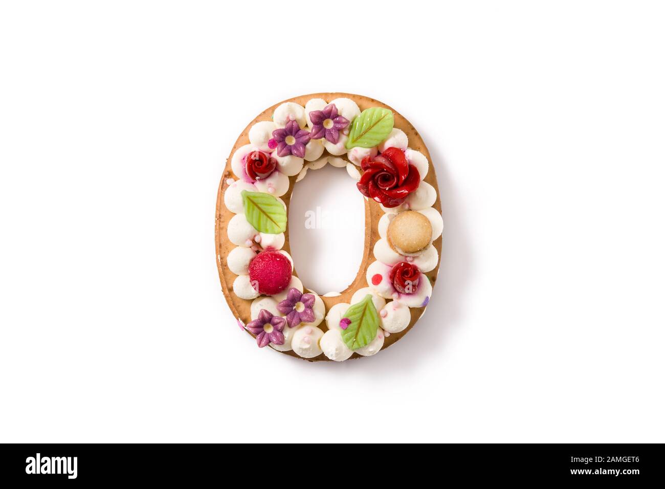 Number zero cake decorated with flowers and macarons isolated on white ...