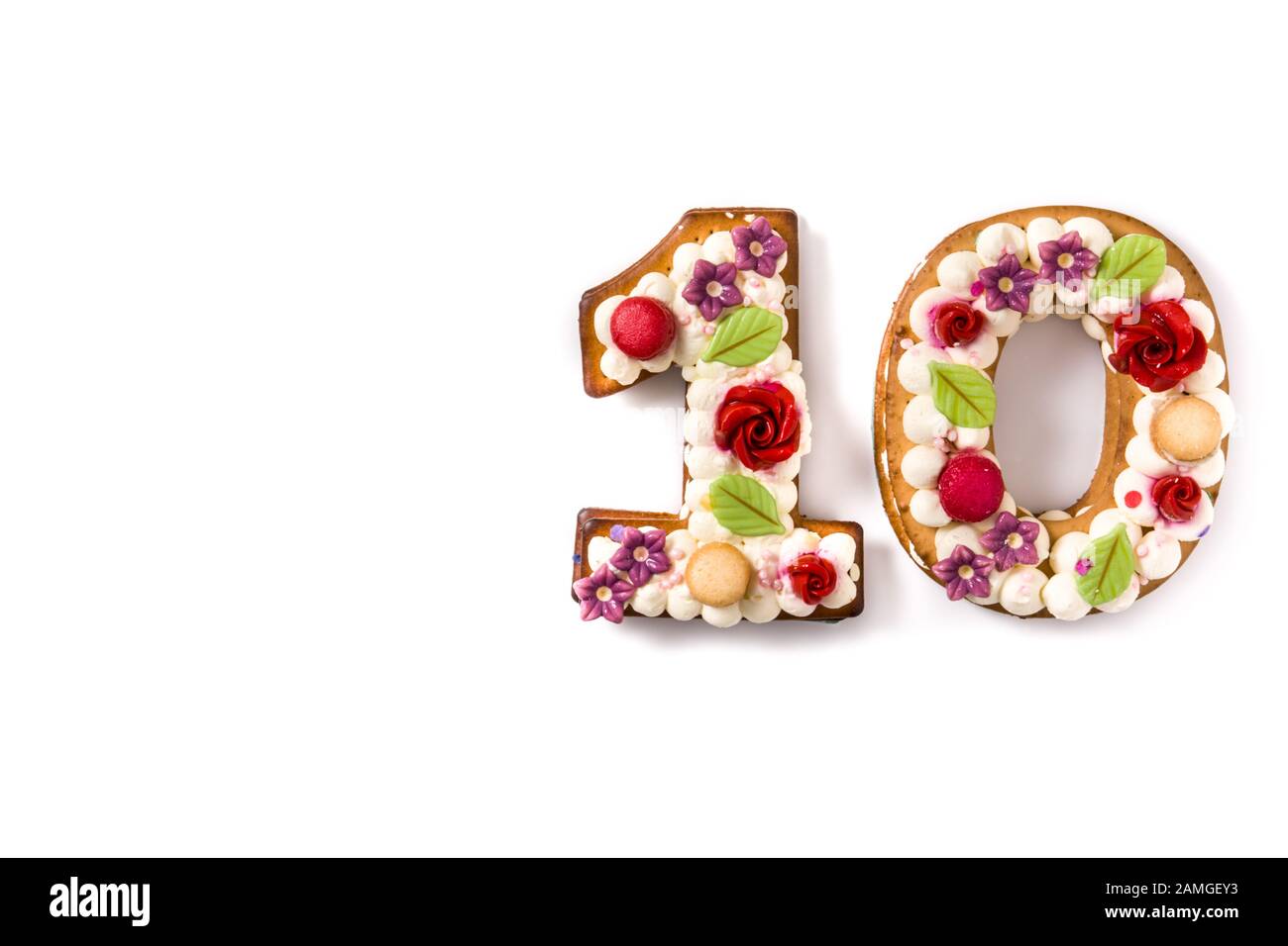 Number ten cake decorated with flowers and macarons isolated on white ...