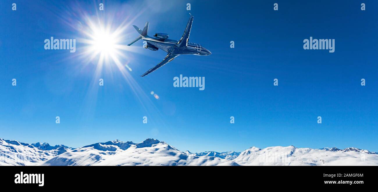 executive jet in flight over the Alps Stock Photo - Alamy