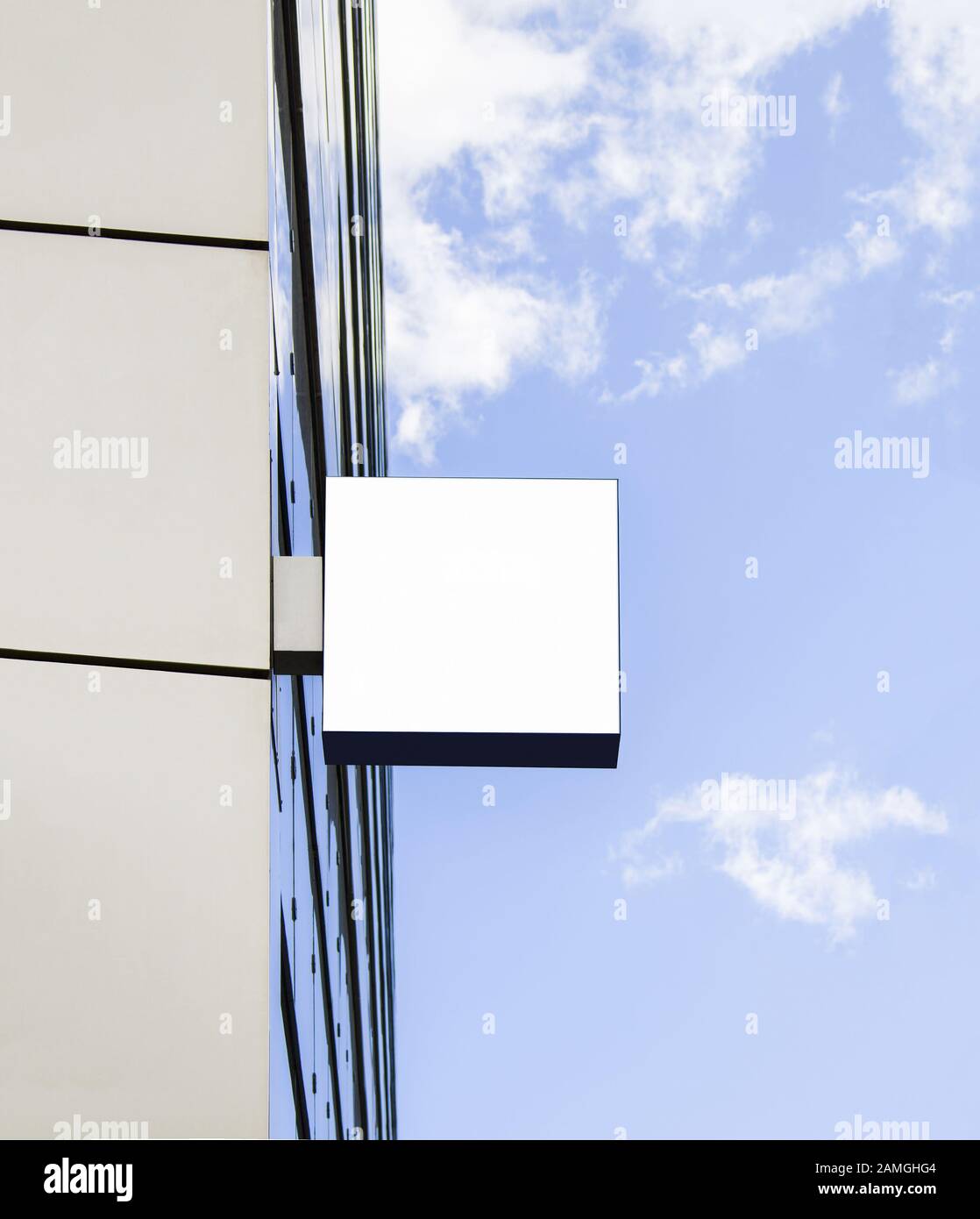 Blank white square sign on glas wall mockup, sky background Stock Photo ...
