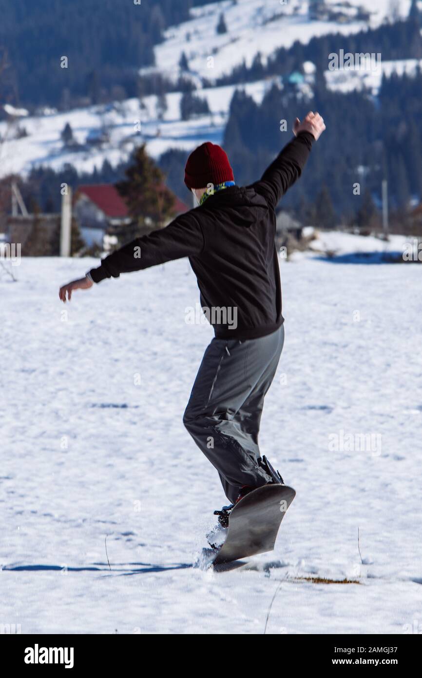 man jumping with snowboard Stock Photo - Alamy