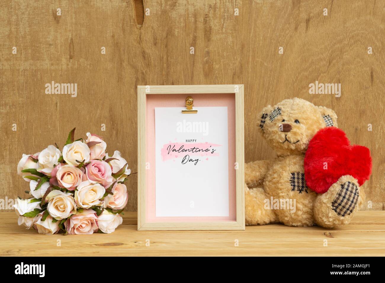 Mockup Picture frame and cute bear holding red heart with Bouquet of ...