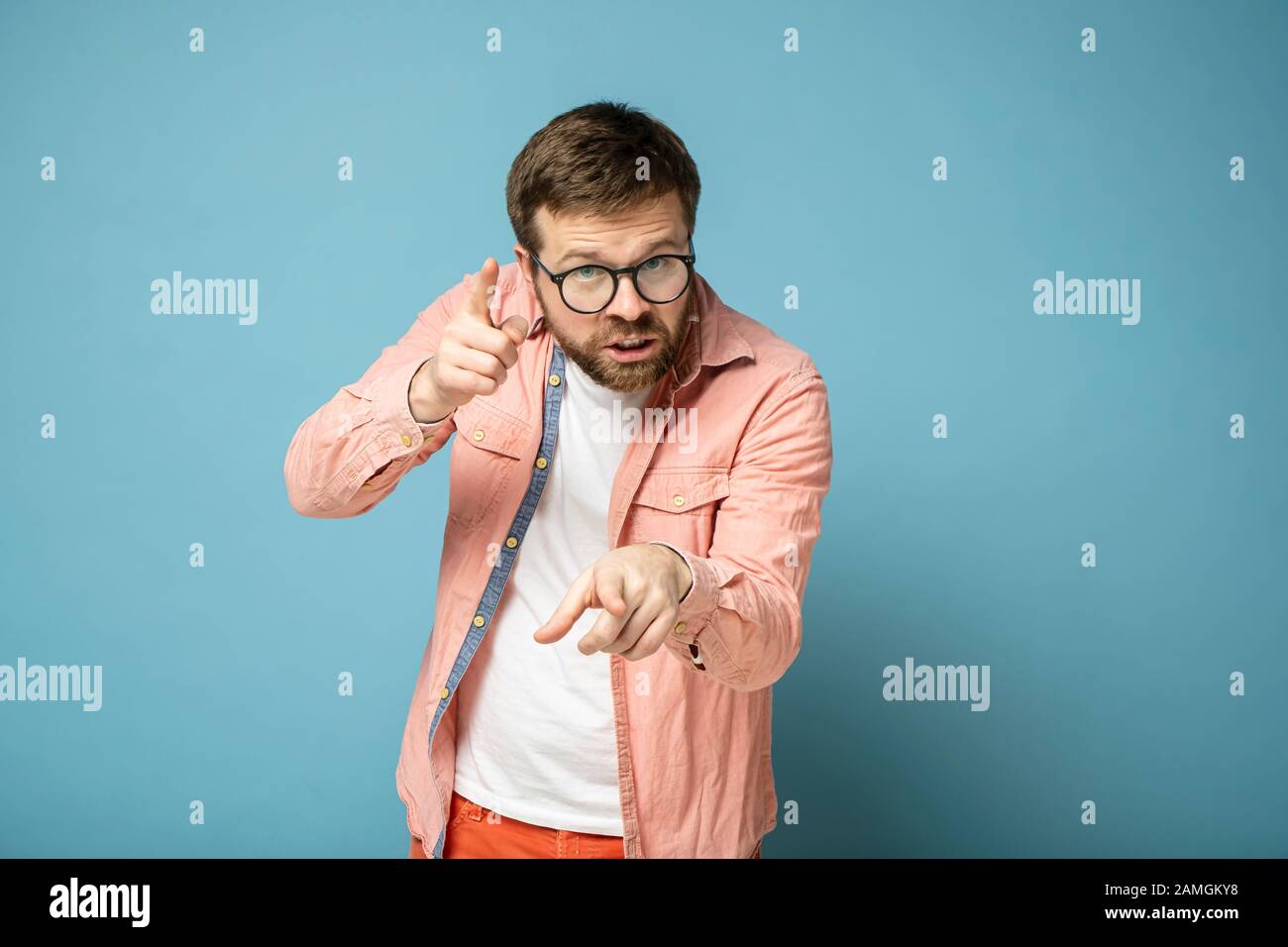 Pointing at someone angrily hi-res stock photography and images - Alamy
