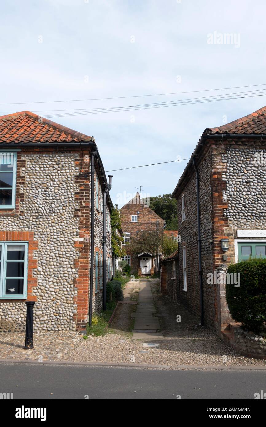 Traditional flint houses in the village of Cley Next The Sea, North ...