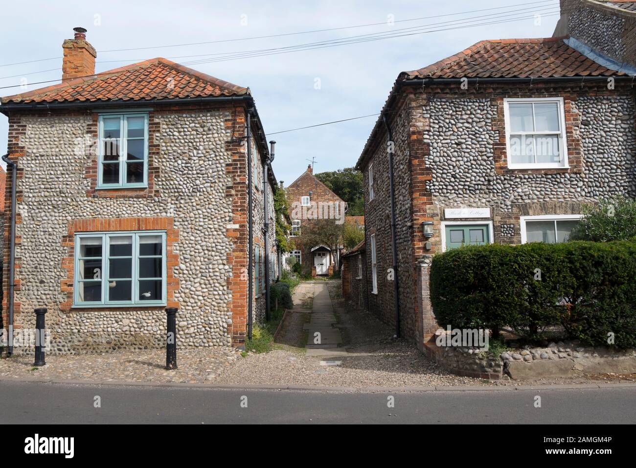 Traditional flint houses in the village of Cley Next The Sea, North ...