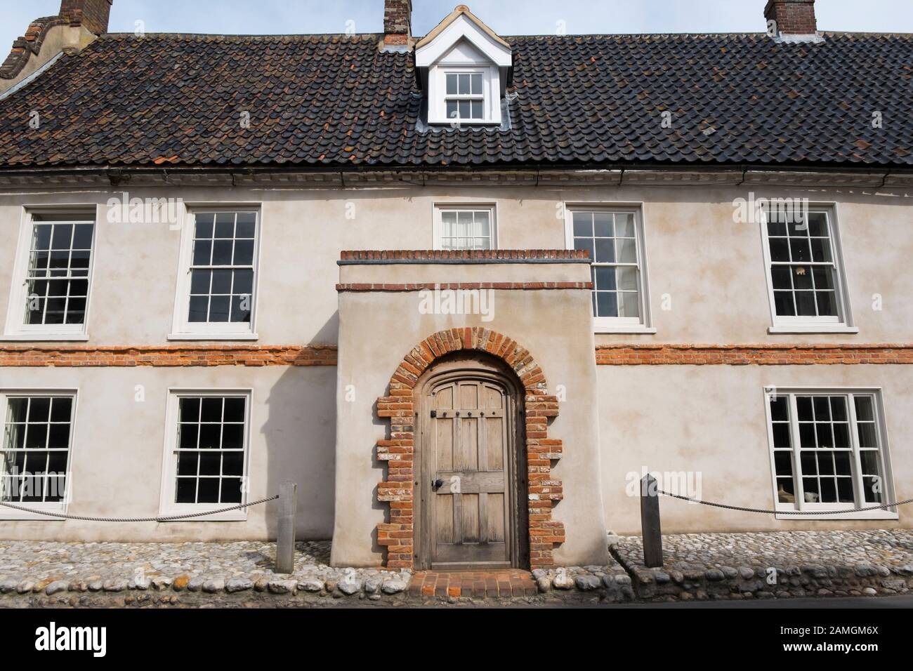 Traditional flint houses in the village of Cley Next The Sea, North ...