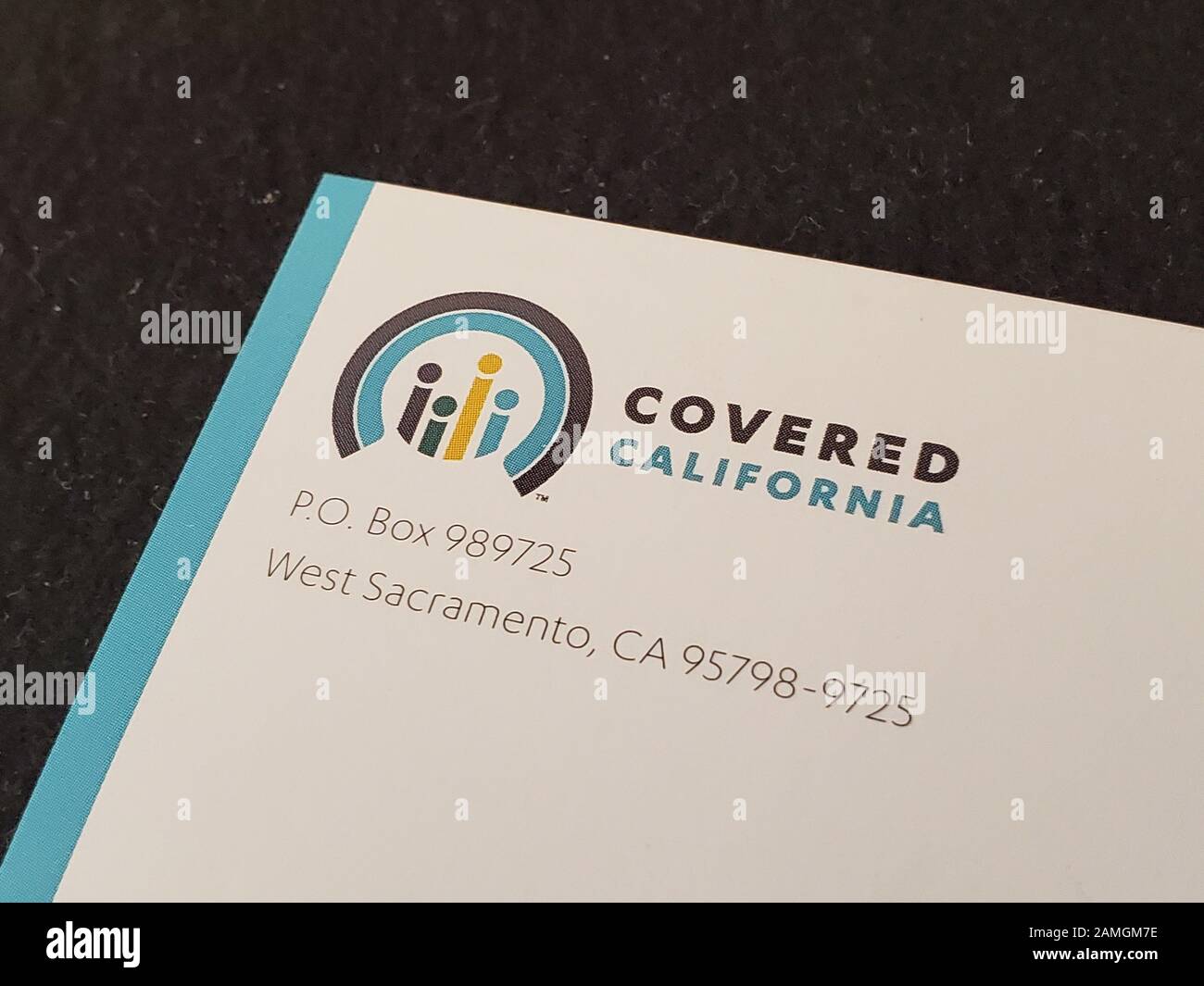 Close-up of logo on paper for Covered California healthcare agency on ...