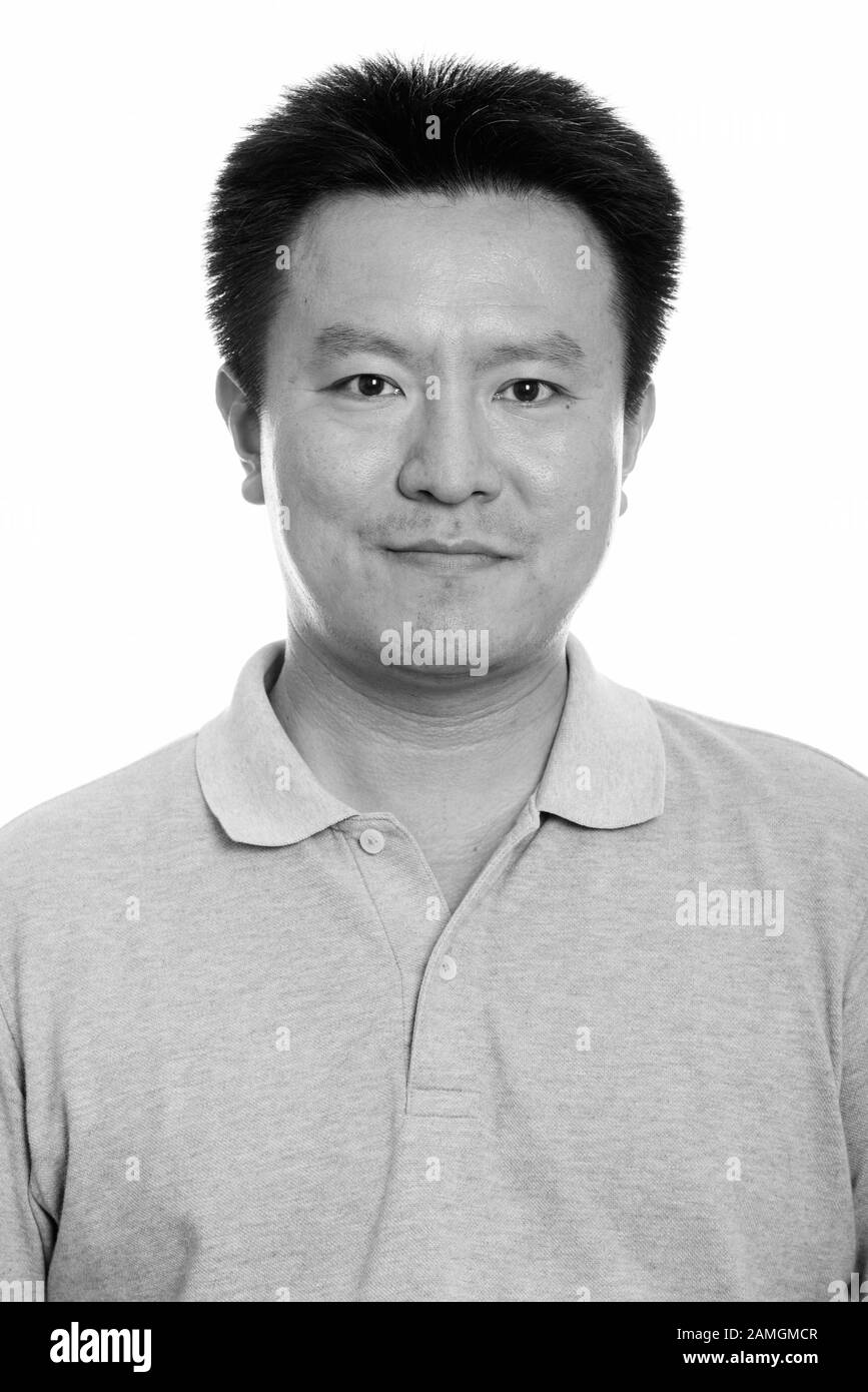 Face of Japanese man looking at camera Stock Photo - Alamy