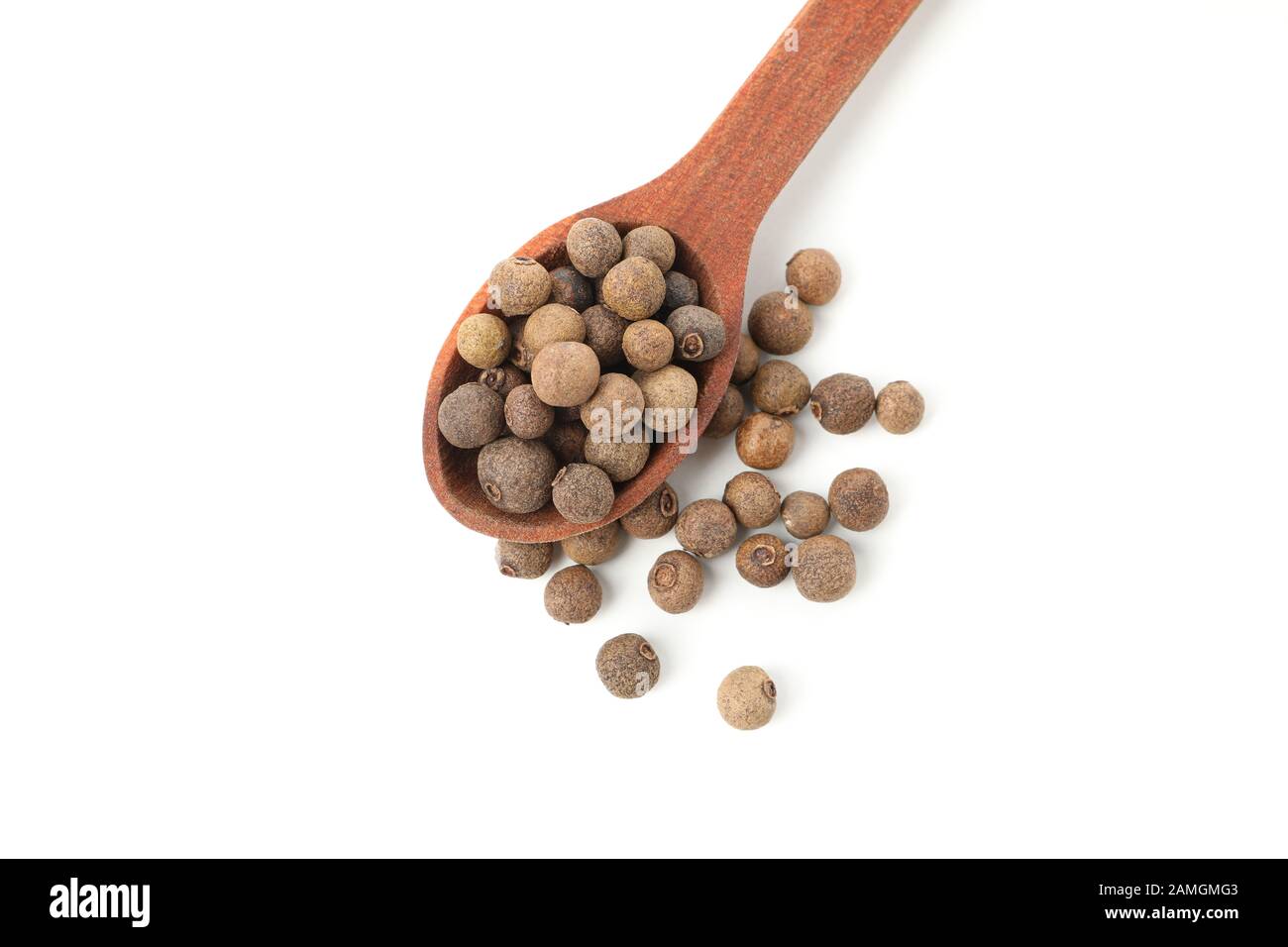 Wooden spoon with peppercorns isolated on white background, close up ...