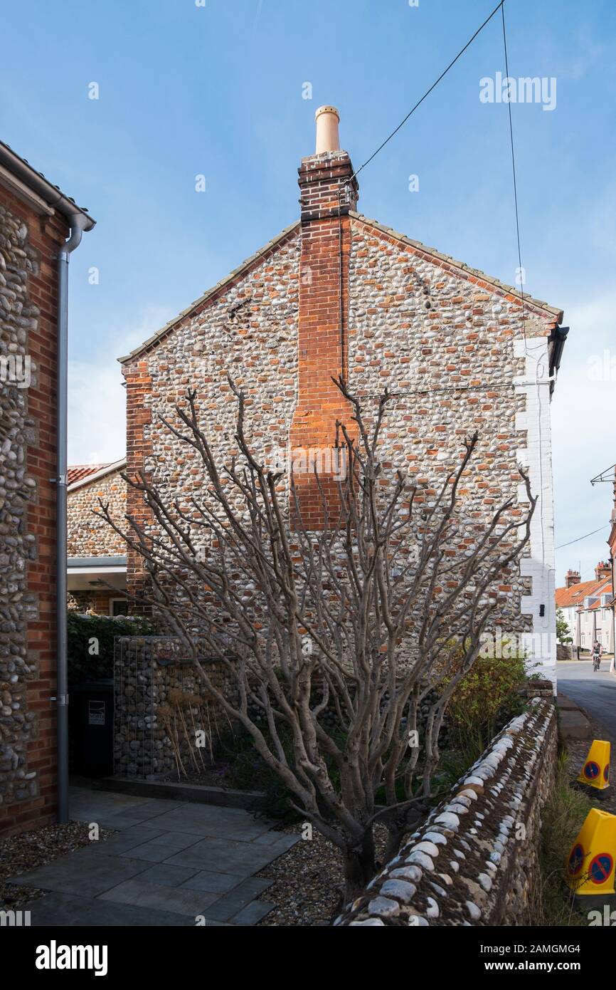 Traditional flint houses in the village of Cley Next The Sea, North ...